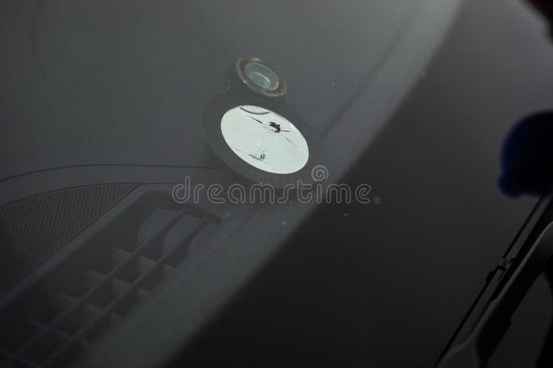 Windshield Chip before Repair. Visible Spider Cracks in the Windshield ...