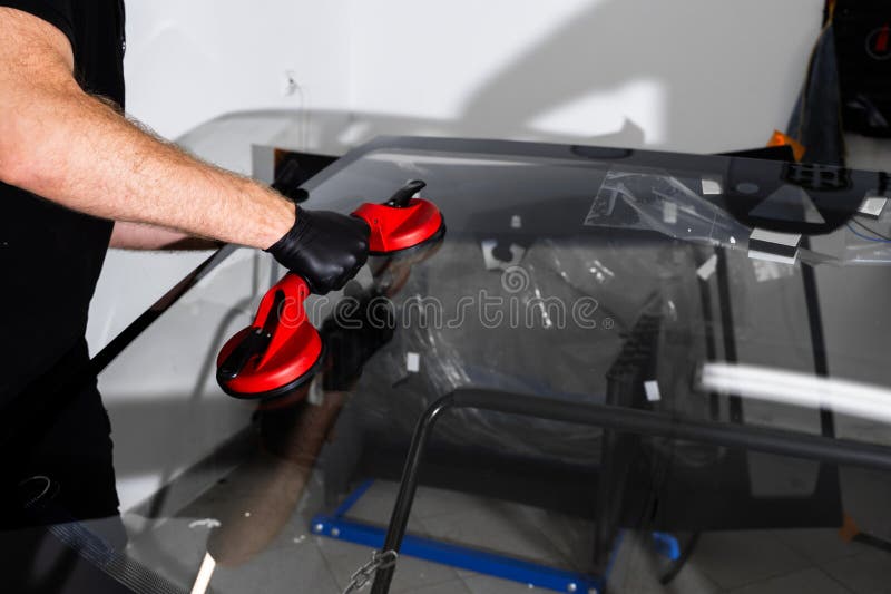 Windshield Removal and Installation Using Suction Lifters. Windshield ...