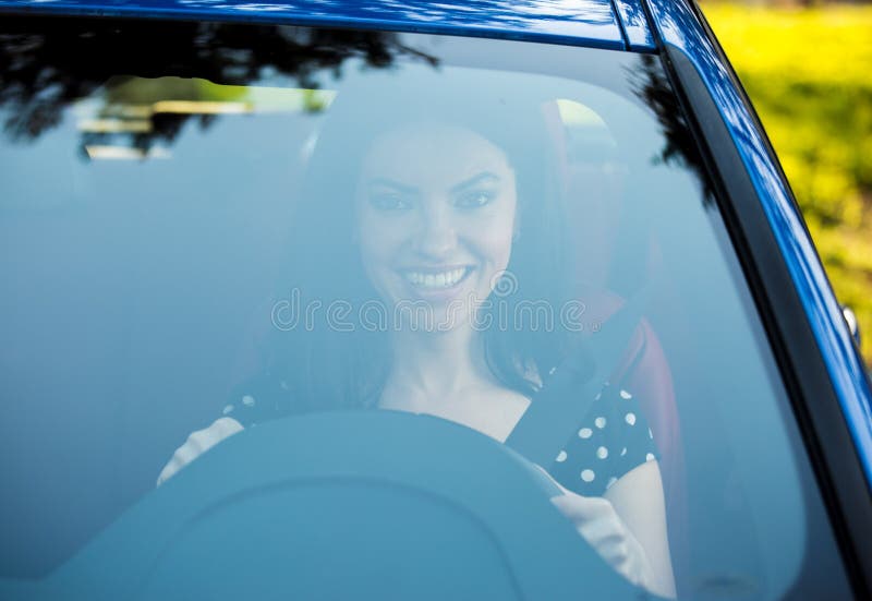 Windshield View of a Woman Driving Her New Car. Stock Photo - Image of ...