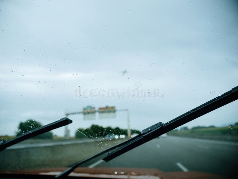 Windshield Wipers in Action during Rain on a Highway Stock Image ...