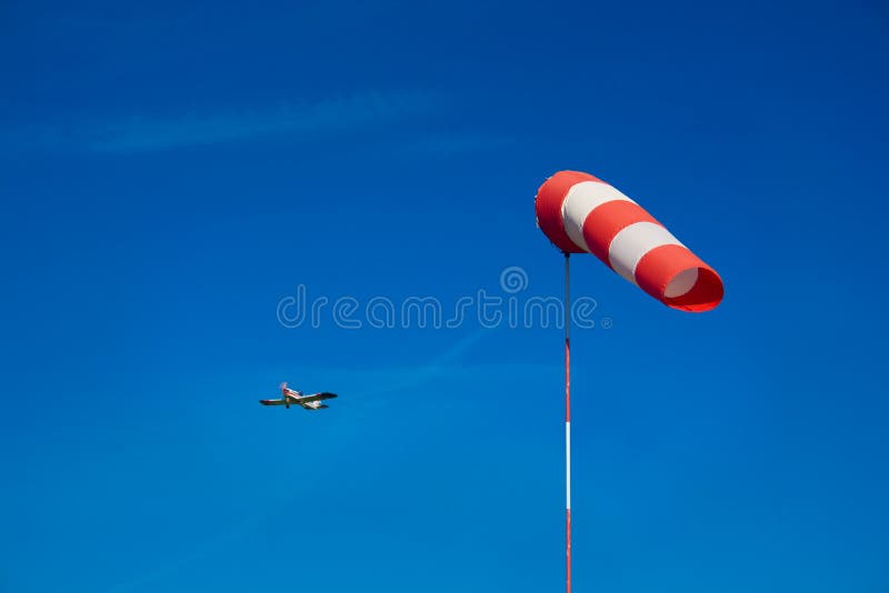 Windsock and airplane stock photo. Image of aerospace - 24189318