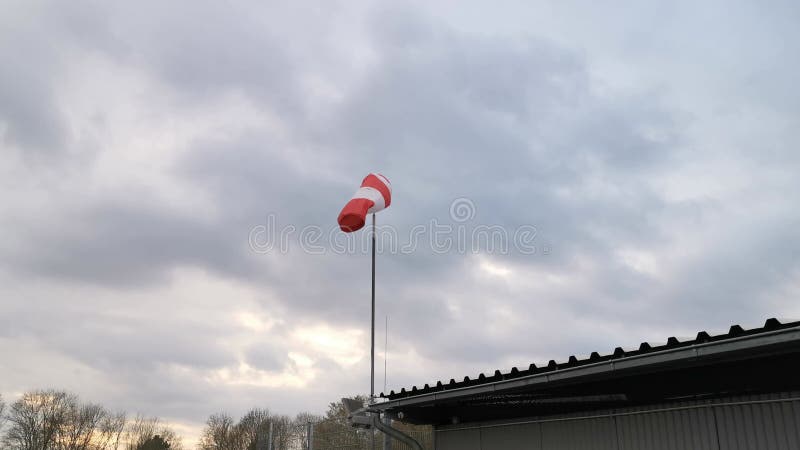 Windsock Blowing in the Wind on Cloudy Sky Stock Video - Video of ...