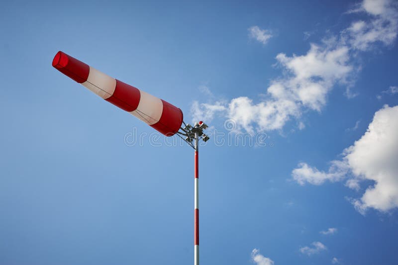 Windsock Blown by the Wind with Overcast Sky Stock Photo - Image of ...