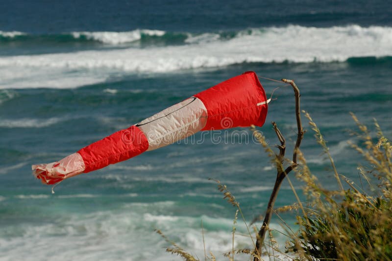 A Windsock Erected Next To the Beach Stock Image - Image of seaside ...