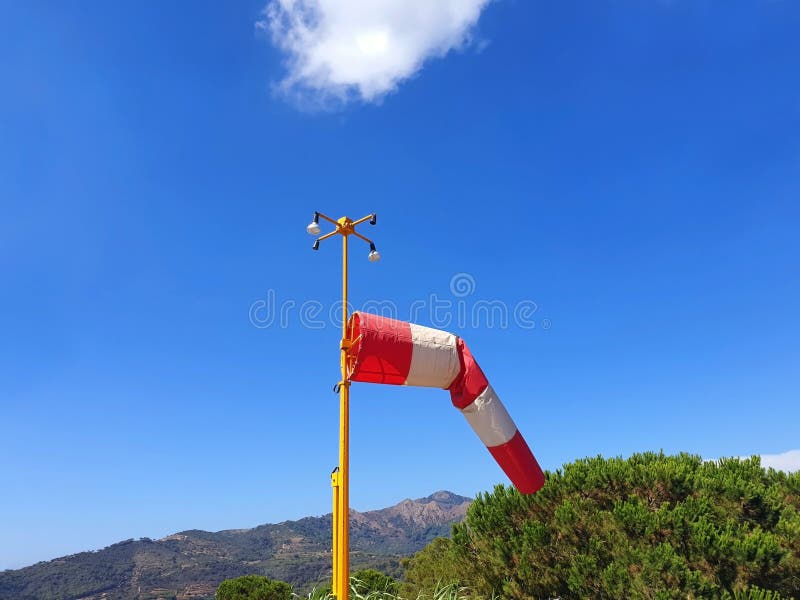 Windsock indicator stock photo. Image of blue, windsock - 263611160
