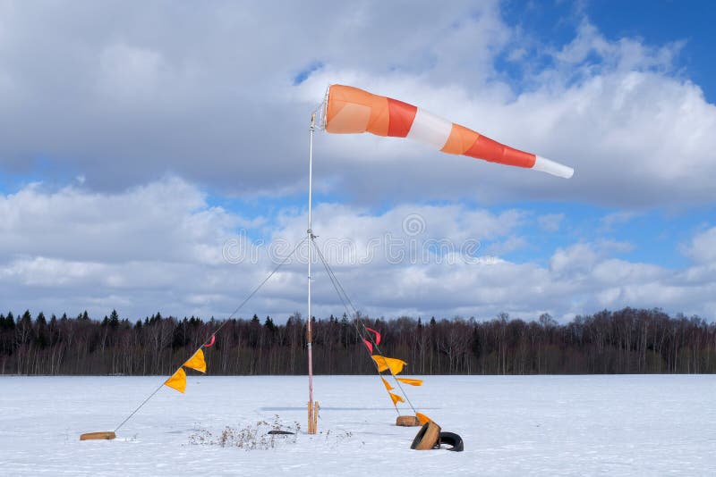Windsock is on the Snowy Field. Stock Photo - Image of snowy, winter ...