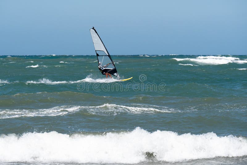 Windsurf Riding the Waves in a Choppy Sea Editorial Image - Image of ...