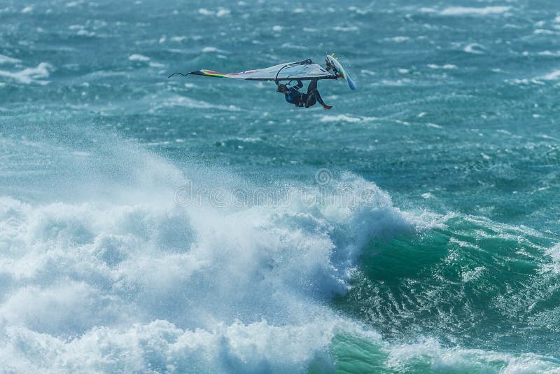 Windsurf Wave Jump Falling stock image. Image of female - 33548861