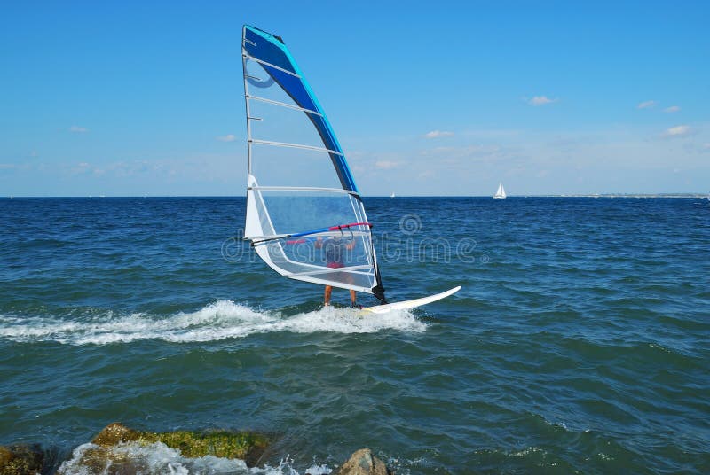 Windsurfer stock photo. Image of coastline, hobbies, surf - 11303096