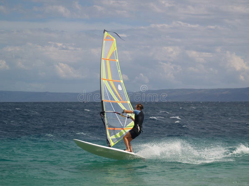 Windsurfer stock image. Image of wave, people, surfer - 1293929