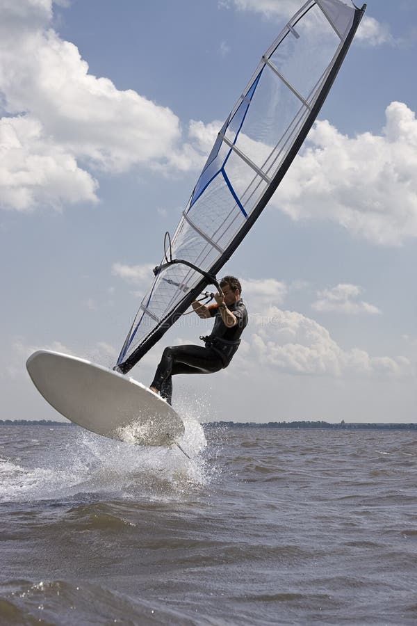 Windsurfer and large wave editorial image. Image of active - 12243465