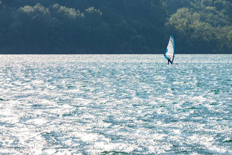 Windsurfer on the lake stock photo. Image of sailing - 61324218