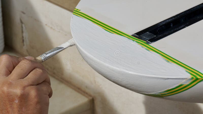 Surf Repair Professional Working on a Surfboard Stock Photo - Image of ...