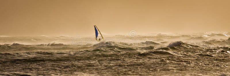 Windsurfing at sunset stock image. Image of vacations - 15577793