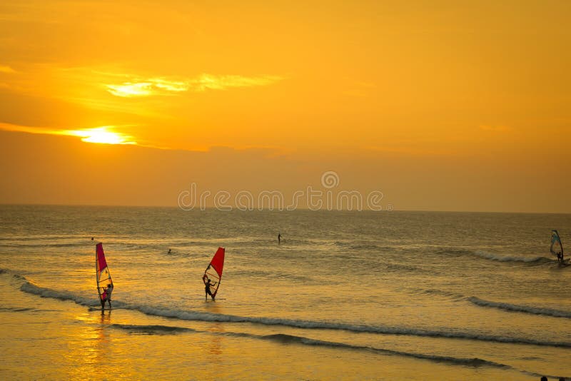 Windsurfing at sunset stock image. Image of environment - 37002063