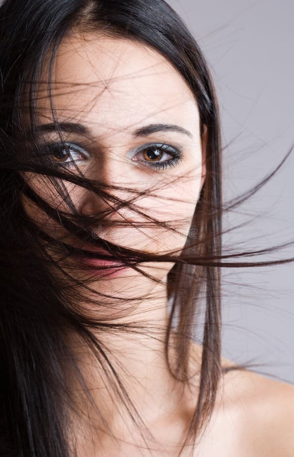 Windswept mystery. stock image. Image of woman, looking - 26125199