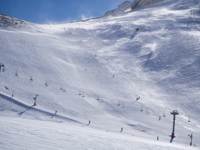 Windy day on the slope stock photo. Image of slope, skiing - 77165952