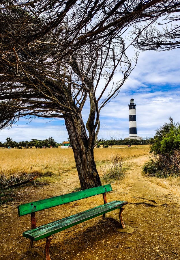 Windy island - Lighthouse stock image. Image of france - 288000611