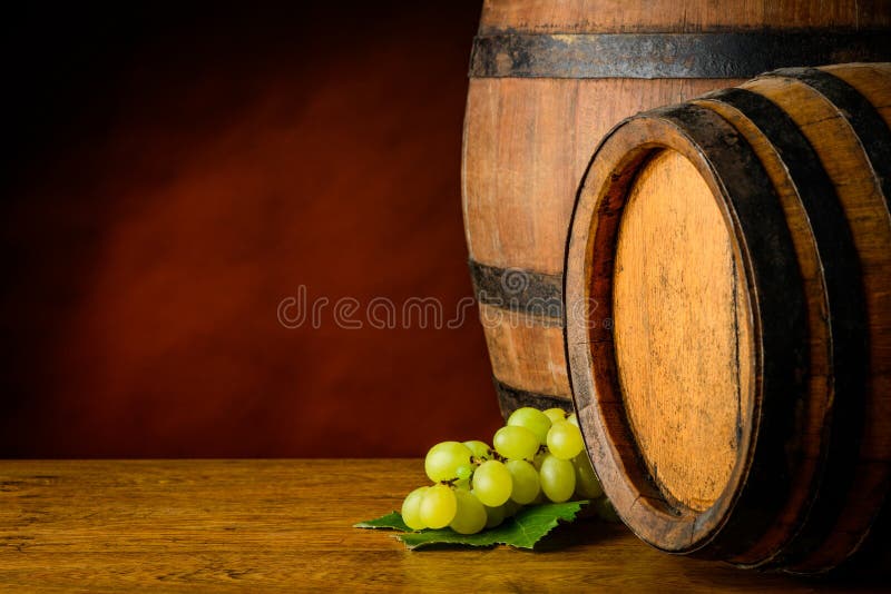 Wine barrels and grapes stock image. Image of wine, wooden - 62679513