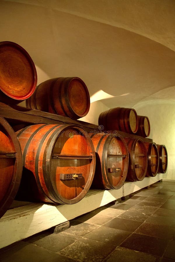 Wine Barrels for Storage in Traditional Cellar Stock Photo - Image of ...
