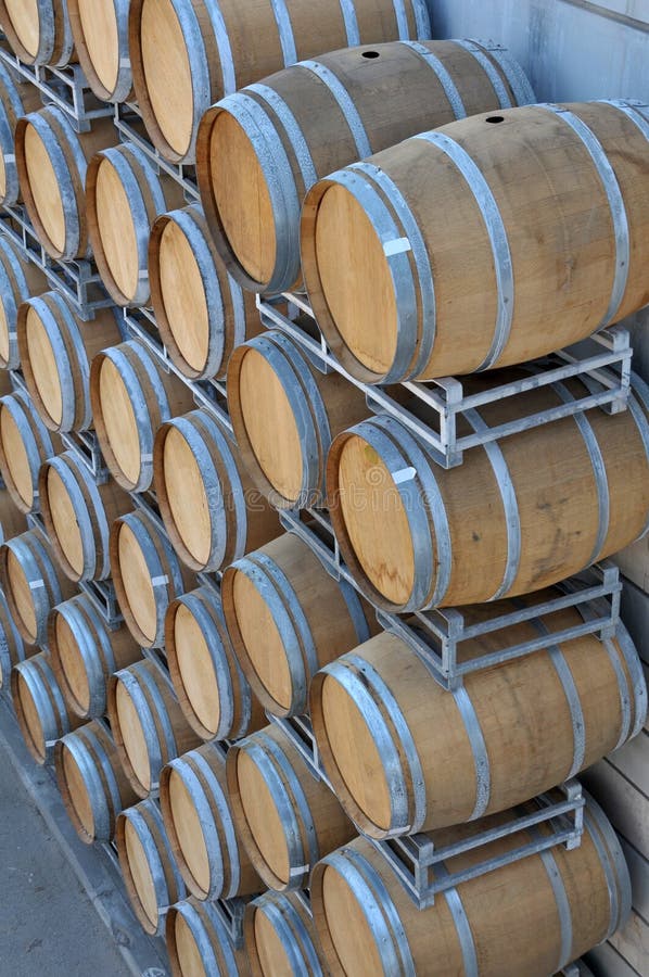 Wine Barrels Stacked in Winery Straight View Stock Image - Image of ...