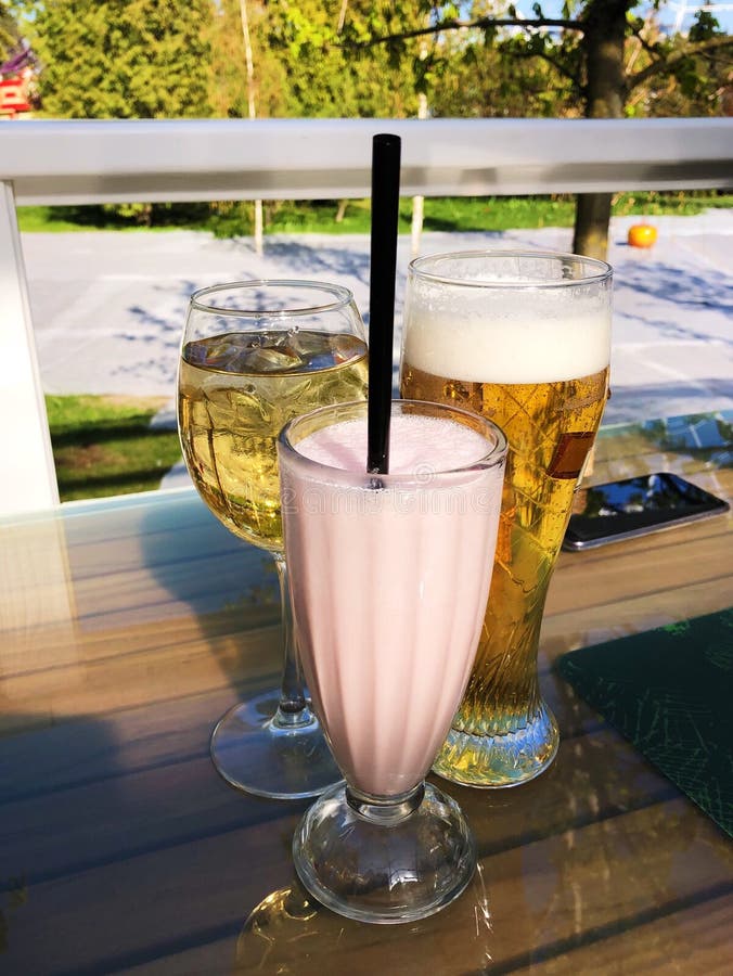 Wine Beer and Milkshake on the Table Stock Photo - Image of cocktail ...