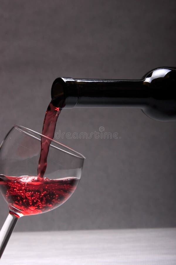 Wine Being Poured from a Bottle. Stock Image - Image of container, neck ...