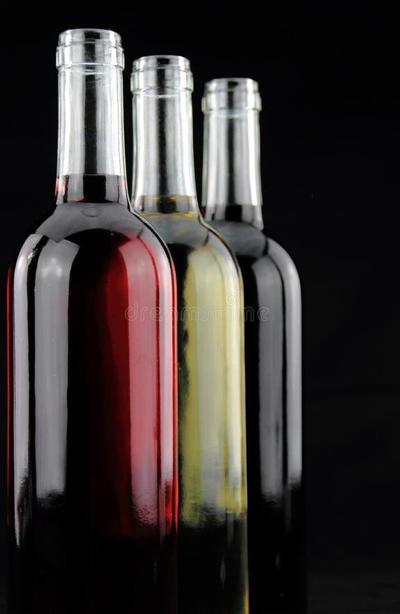 Wine in bottles stock image. Image of alcoholic, gold - 20470525