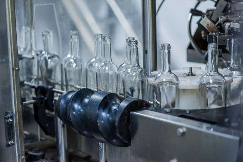 Bottle Factory, Row of Glass Bottles Stock Photo - Image of glow, cycle ...