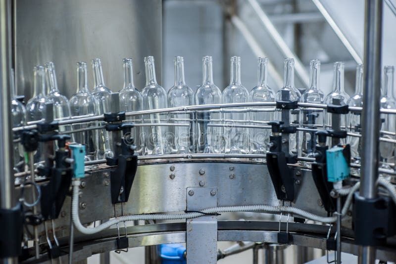 Bottle Factory, Row of Glass Bottles Stock Photo - Image of glow, cycle ...