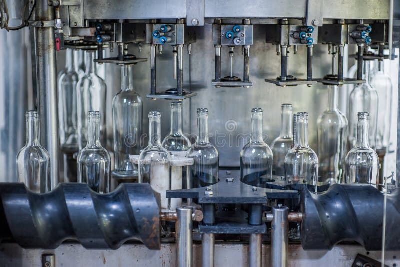 Bottle Factory, Row of Glass Bottles Stock Photo - Image of glow, cycle ...