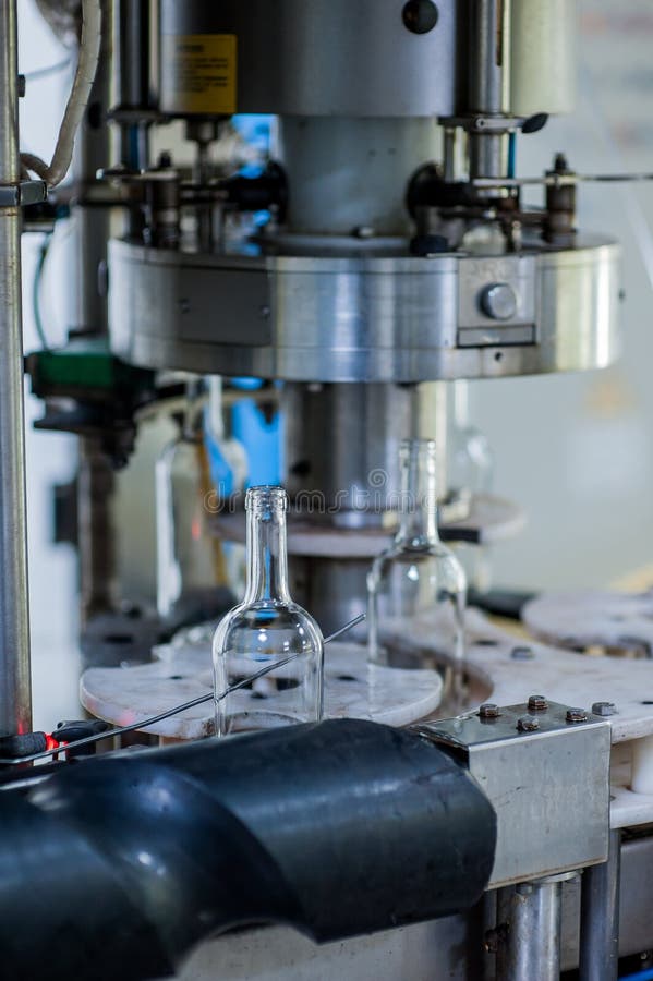 Bottle Factory, Row of Glass Bottles Stock Photo - Image of glow, cycle ...