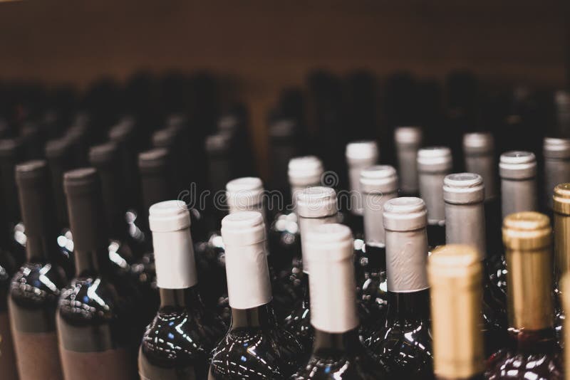 Wine Bottles. Selective Focus. Wine Storage. Showcase with Wine ...