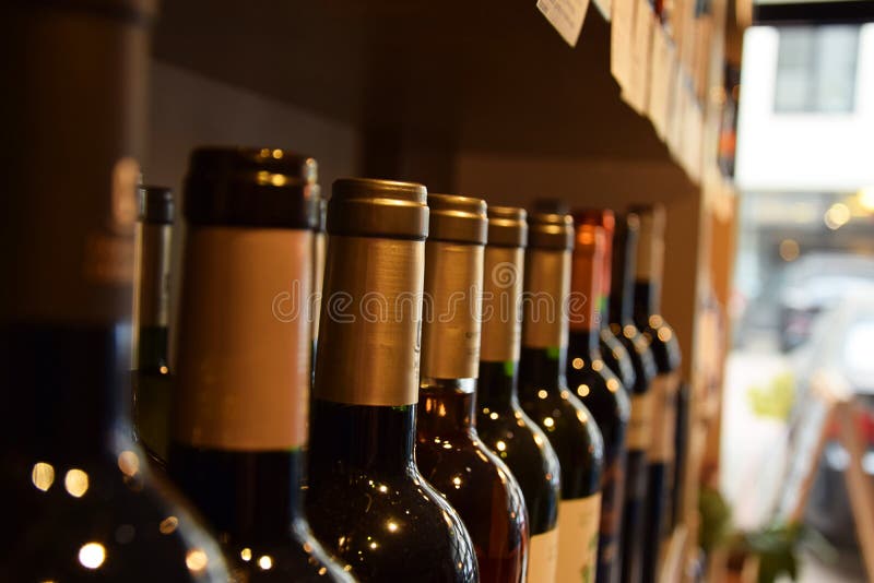 Wine Bottles on Shelf in Wine Store Stock Image - Image of cafe, store ...