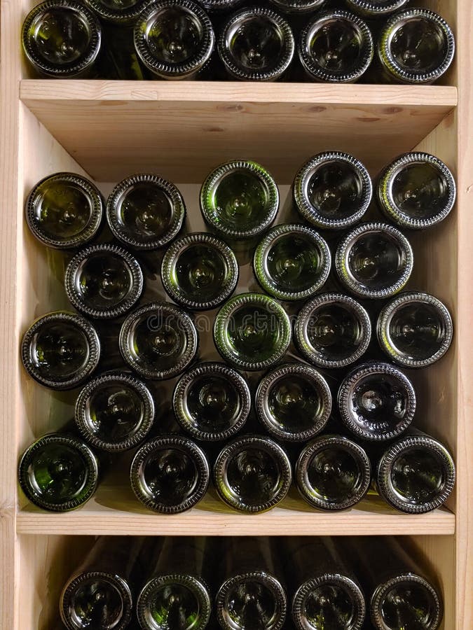 Wine Bottles Stacked on a Shelves in a Basement of a Store Stock Photo ...