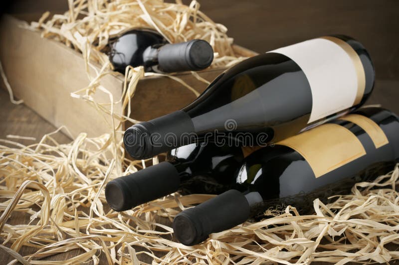 Wine Bottles in Wooden Box and Straw Stock Photo - Image of brown, neck ...