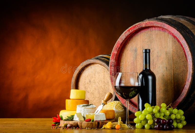 Wine and Cheese Wheel stock photo. Image of bottle, dark - 66125452