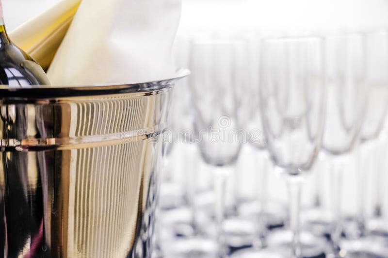 Wine Cooler with Wrapped Bottle and Empty Glasses Stock Photo - Image ...