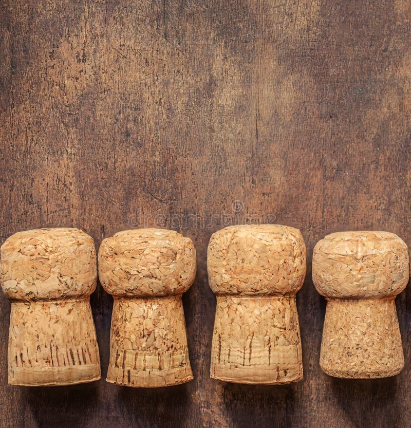 Wine Corks Closeup on a Wooden Table. Four Wine Corks with Copyspace ...