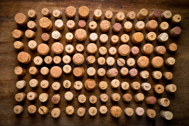 Wine Corks of Different Sizes, Standing Upright on an Old Wooden ...