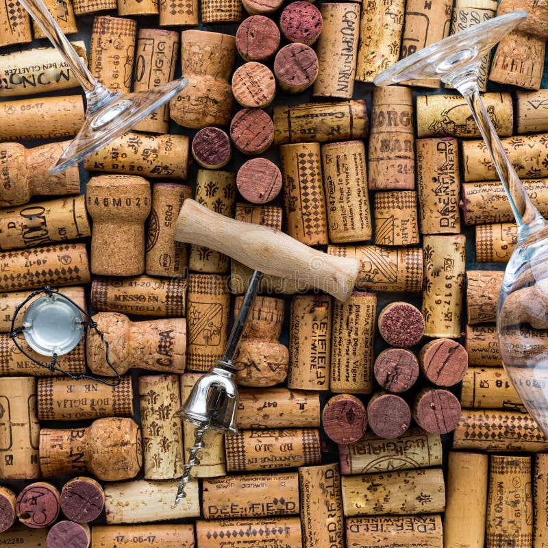 Wine Corks in a Pattern with Wine Glasses and Corkscrew Laying on Top ...