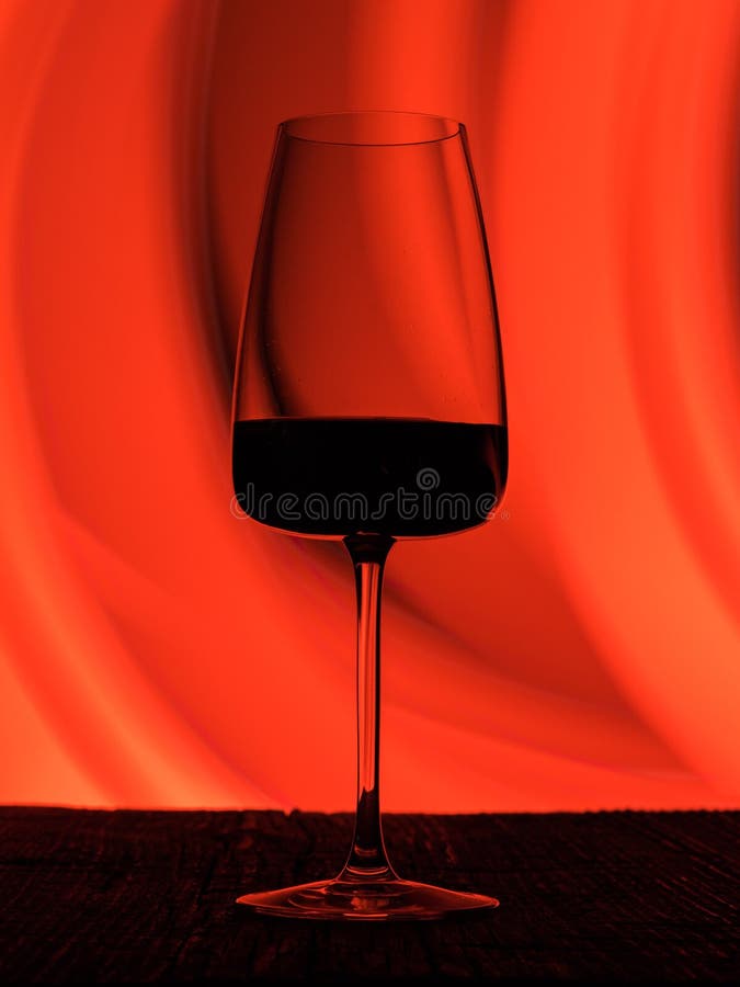 Wine Glass on a Dark Colored Background. Glare in the Glass ...