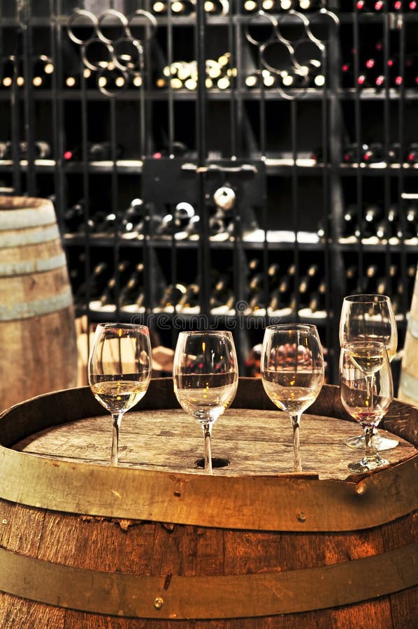 Wine glasses and barrels stock photo. Image of beverage - 8850820