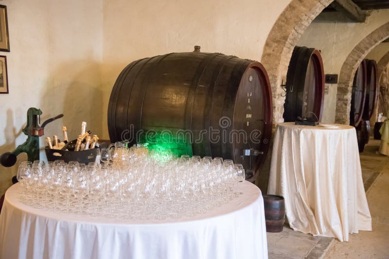 Wine glasses and barrels editorial stock image. Image of container ...