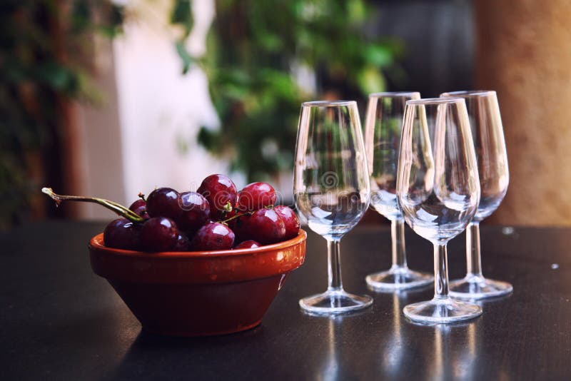 Wine glasses and grapes stock image. Image of glasses - 63602157