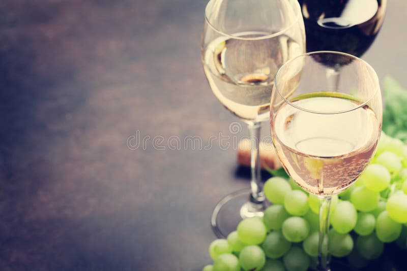 Wine glasses and grapes stock image. Image of space - 100146063