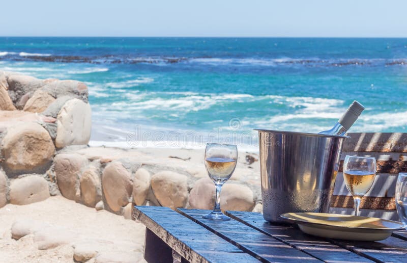 Wine Glasses at a Rustic Beach Restaurant Table Stock Image - Image of ...