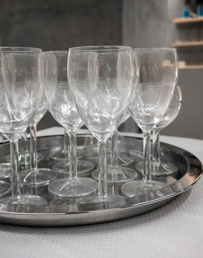 Wine Glasses on Silver Metal Tray on White Table. Stock Image - Image ...