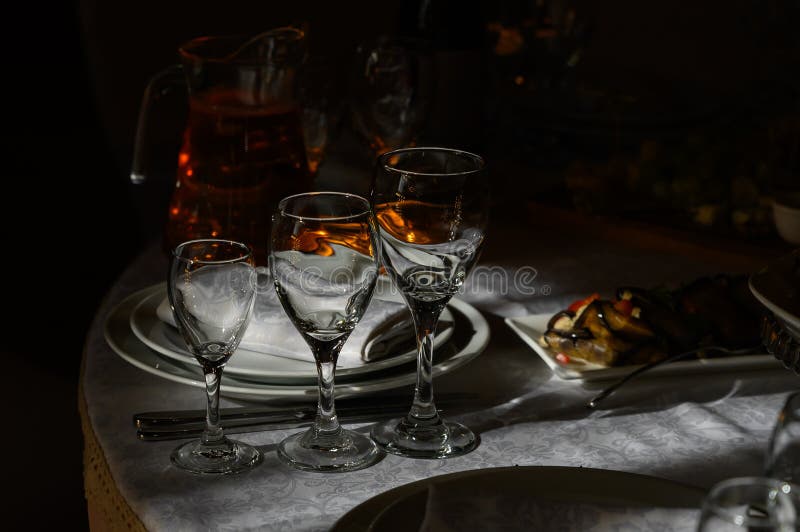 Wine Glasses on the Table in the Morning Sun Stock Image - Image of ...