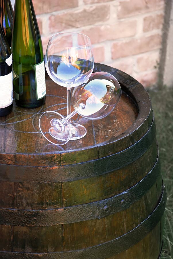 Wine glasses and barrels stock photo. Image of beverage - 8850820